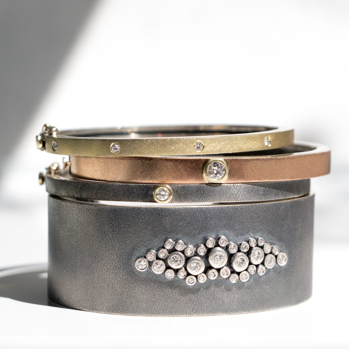 Single Diamond Bangle in Rose Gold by Rene Escobar - NEWTWIST