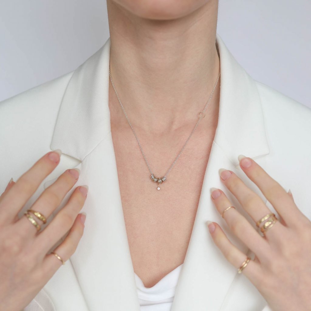 Moving Rings Necklace by Jane Hollinger - NEWTWIST